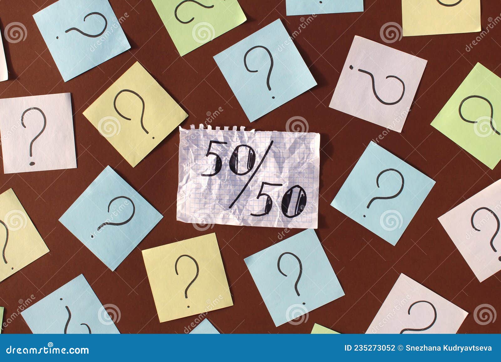 On a White Squared Notebook Paper, it Says 50-50, Surrounded by ...