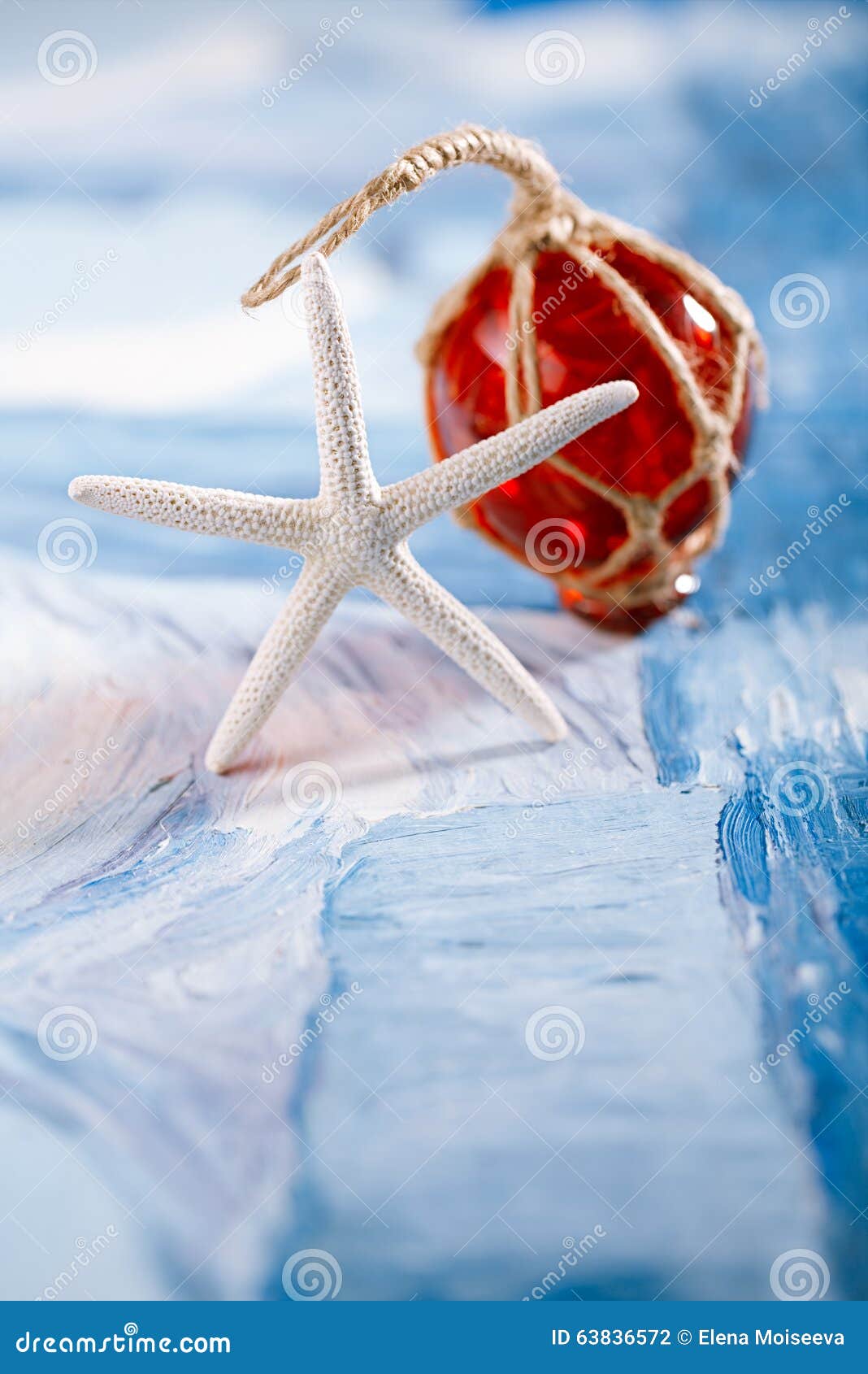 White Starfish with Red Glass Float Stock Photo - Image of string ...