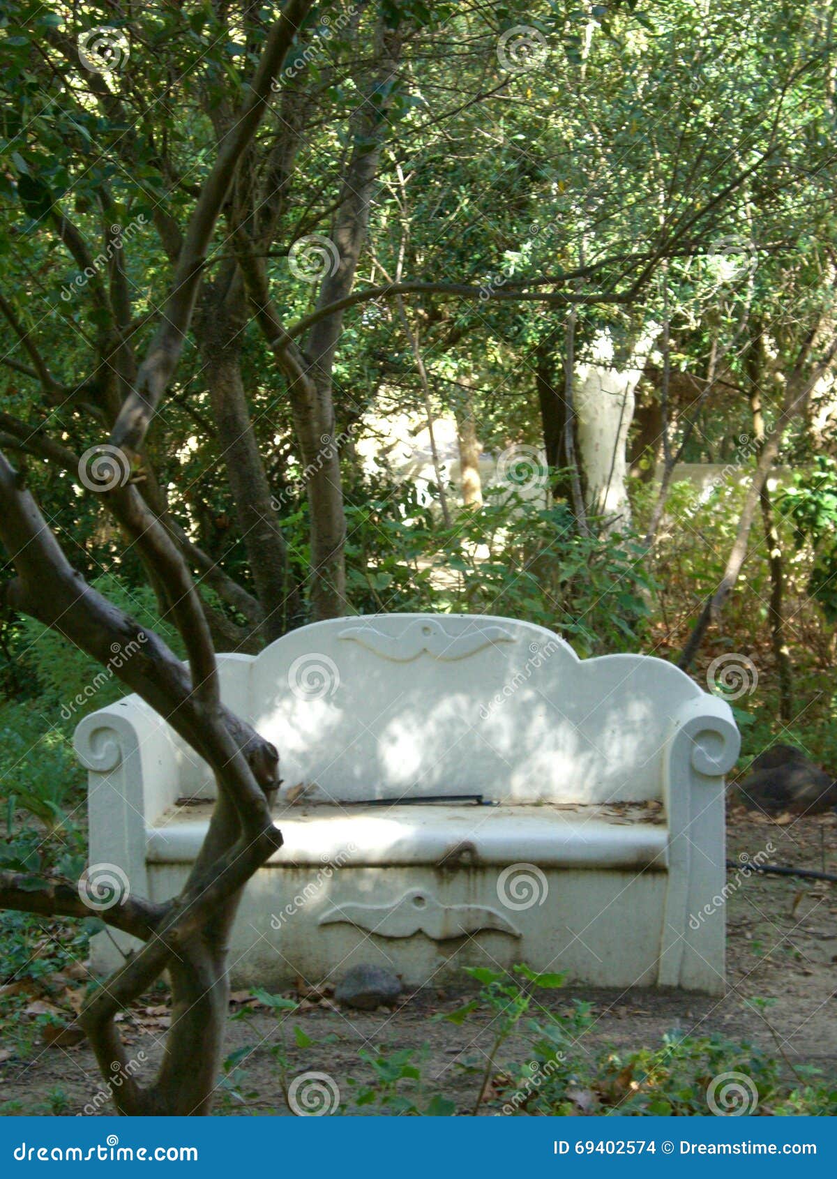 A White Stone Bench in the Woods Stock Photo - Image of woods, left ...