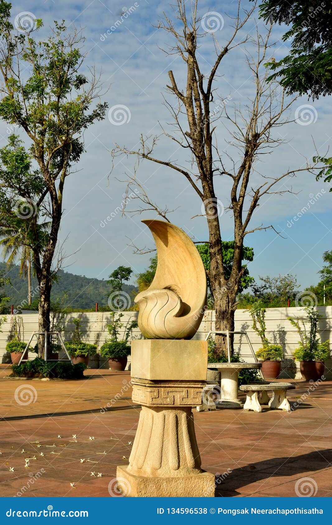 The White Stone Sculture in the Garden with Dried Tree Stock Photo ...
