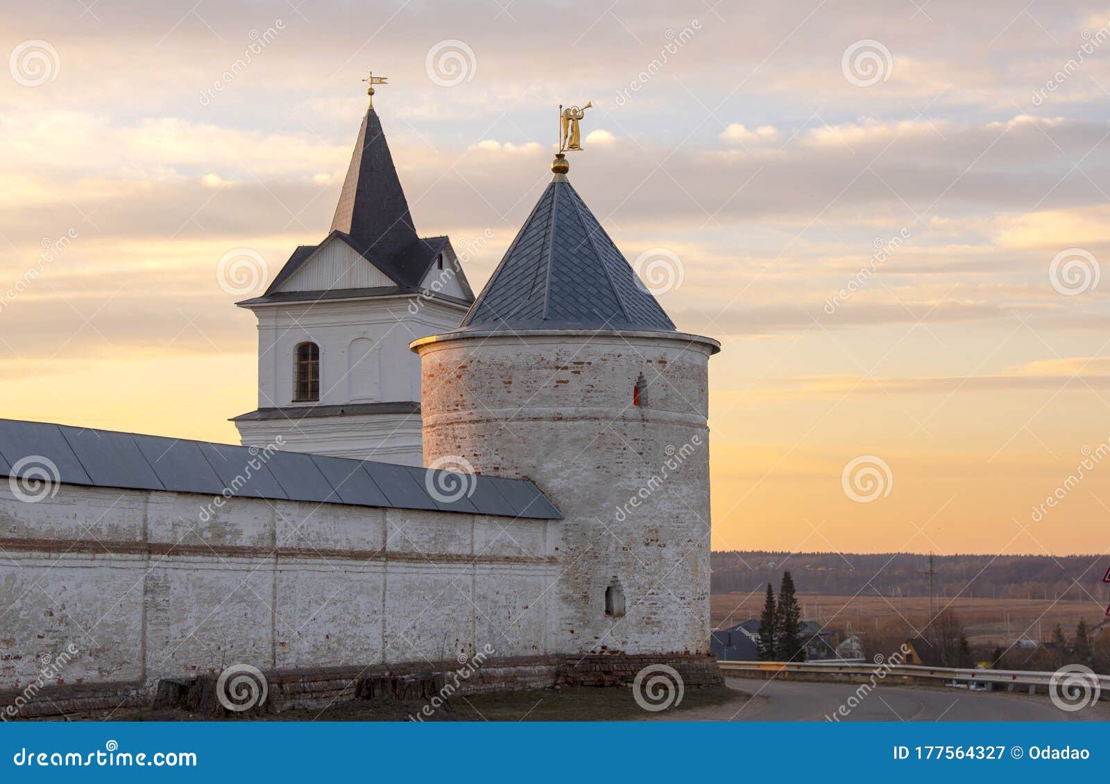 White Stone Wall and Towers of the Monastery Against the Background of ...