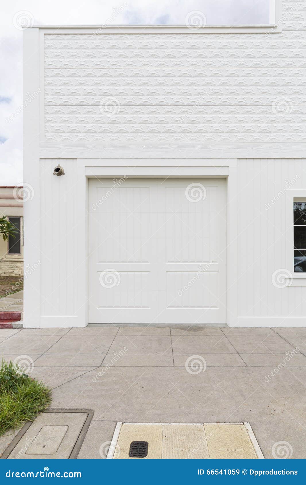 White Storefront Building with Garage Stock Image - Image of economy ...