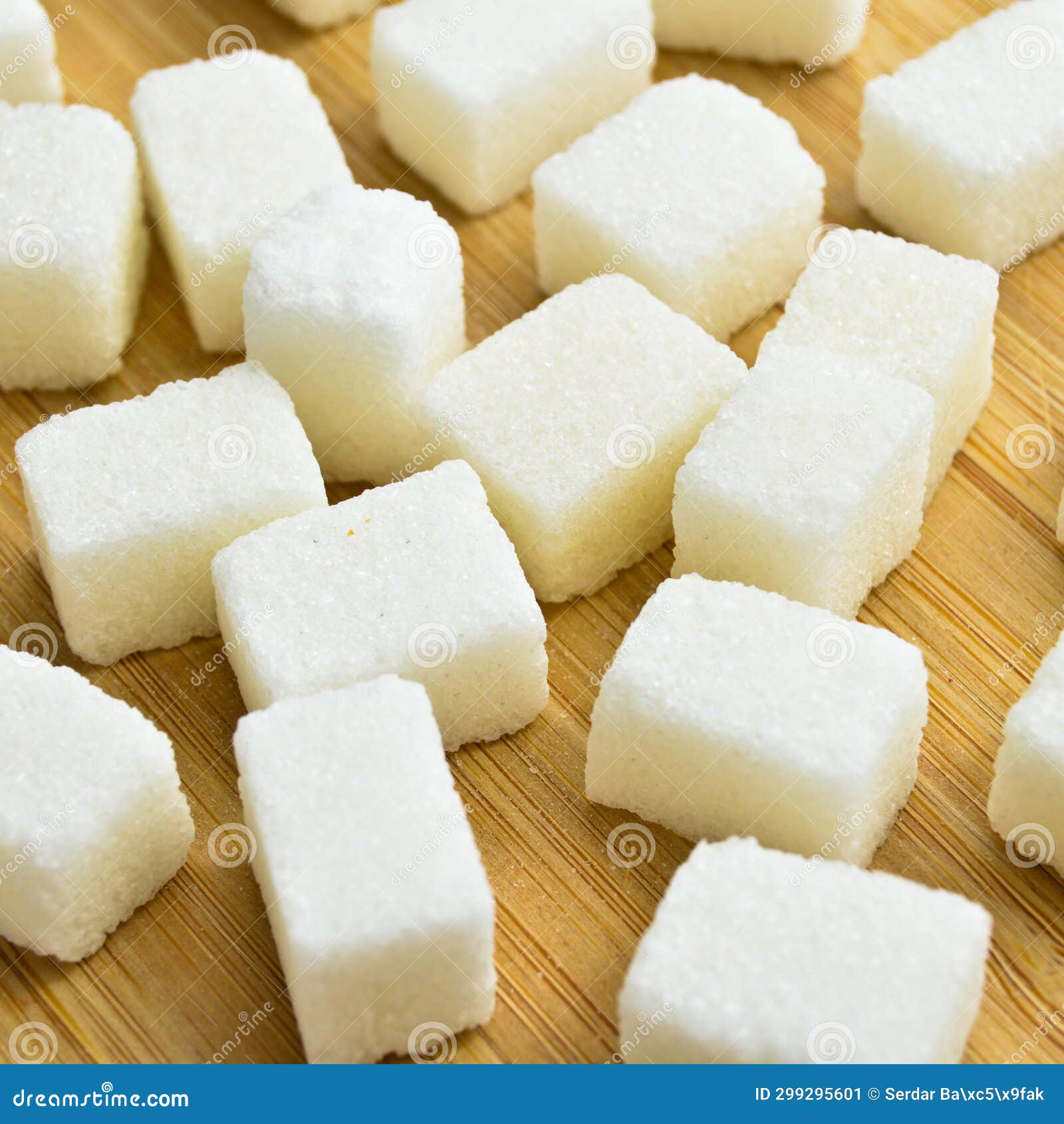 White Sugar Cubes on Bamboo Cutting Board, Sugar Cubes Texture Stock ...