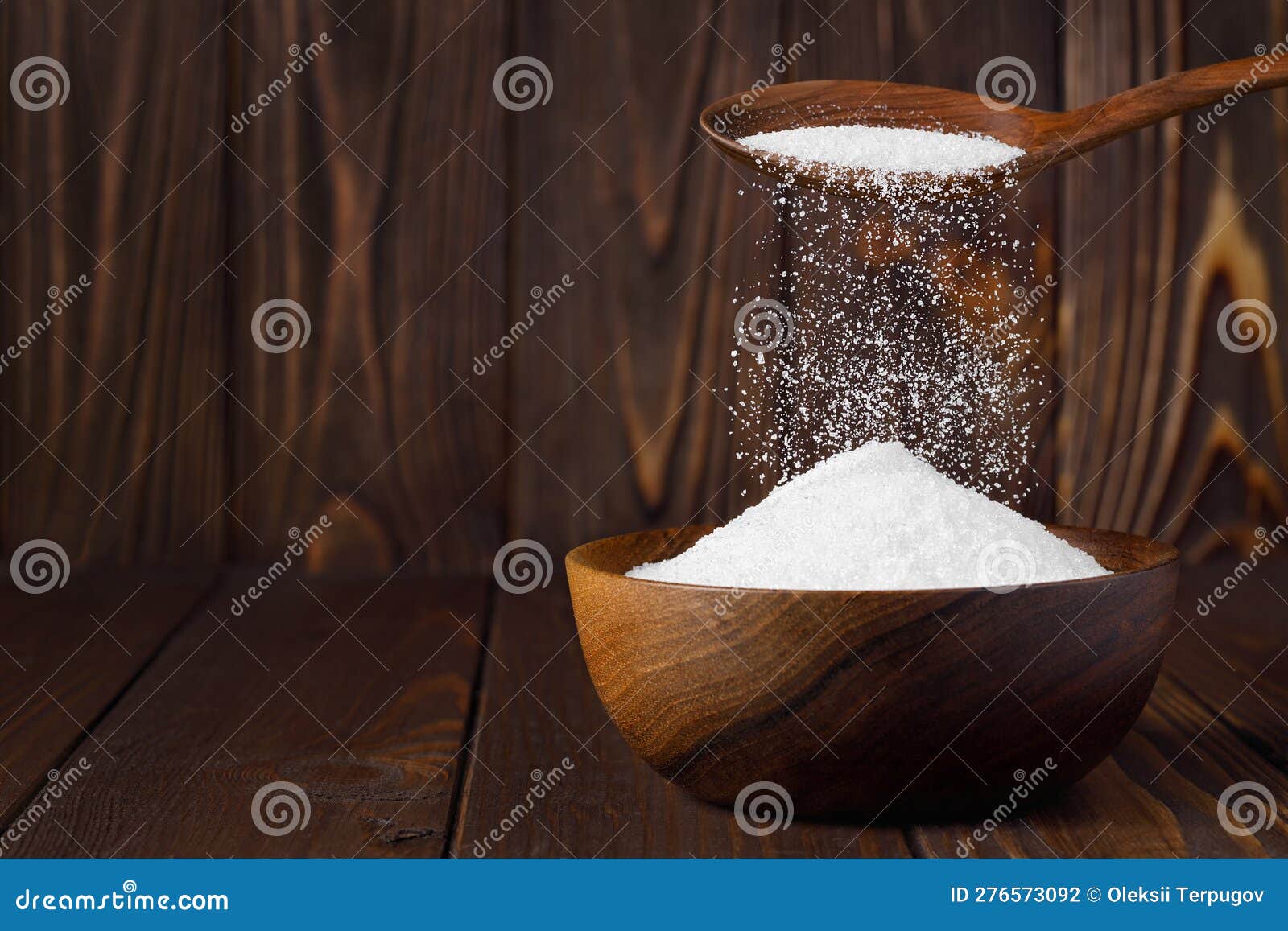 White Sugar Falling from Spoon in Bowl on Table Stock Photo - Image of ...