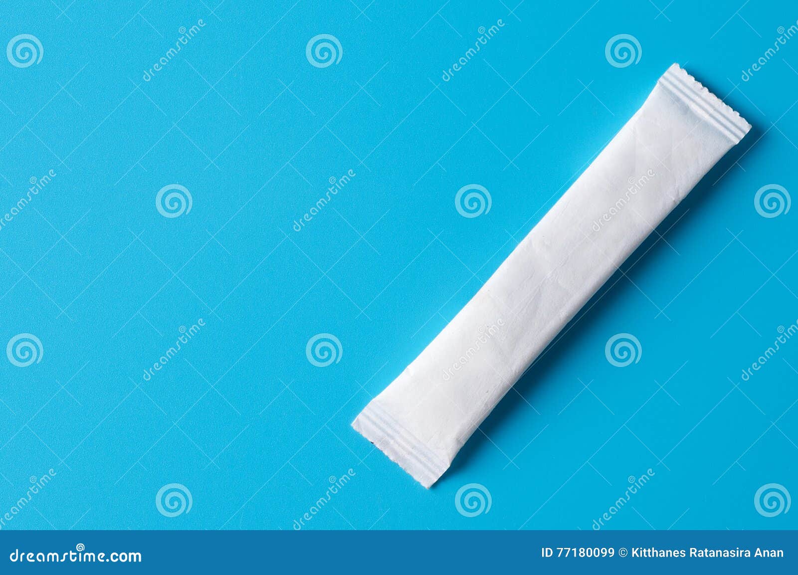White Sugar Packets on a Blue Background Stock Image - Image of food ...