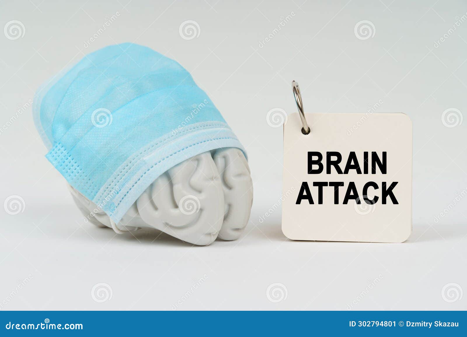 On a White Surface Next To the Brain There is a Notepad with the ...