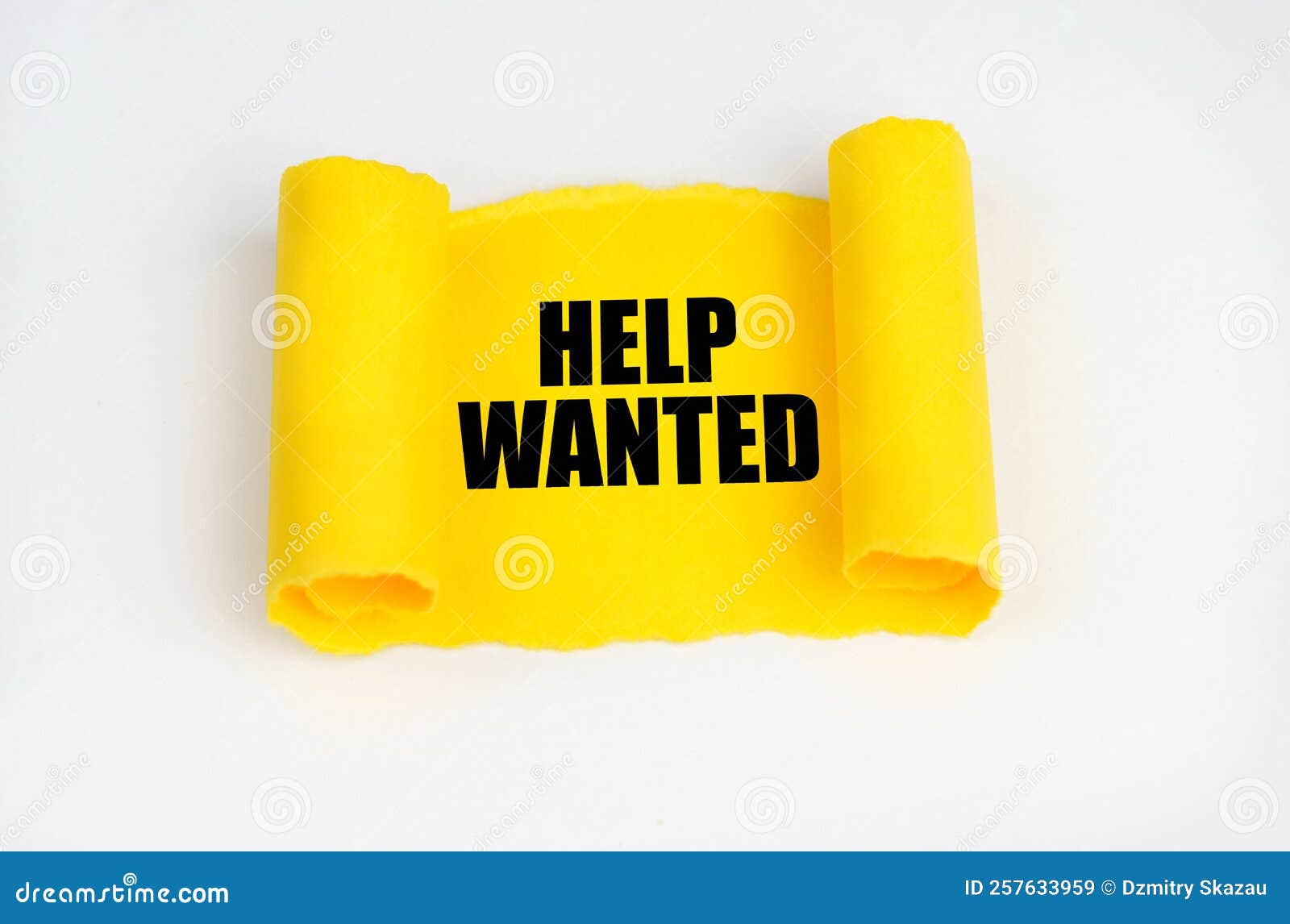 On a White Surface, a Yellow Scroll of Paper with the Inscription ...