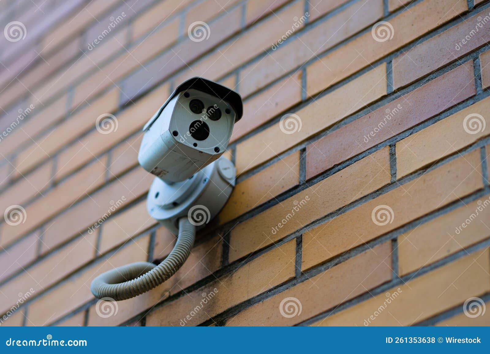 White Surveillance Camera on a Brick Wall Stock Photo - Image of ...