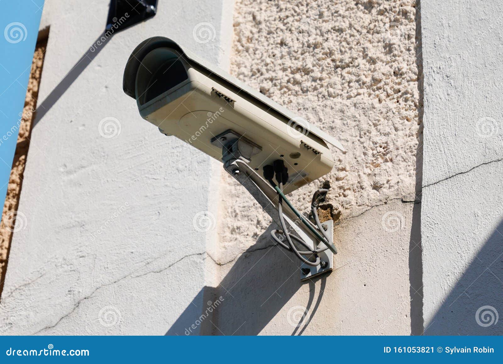 White Surveillance Camera Built in Wall of Building Stock Image - Image ...