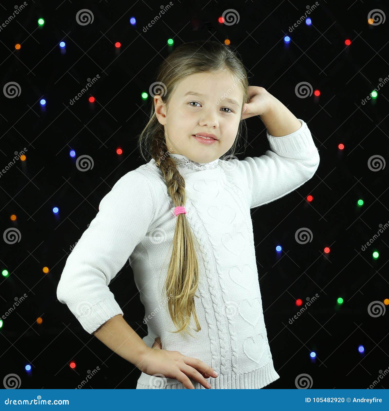 In a White Sweater the Girl is Posing Stock Photo - Image of ...