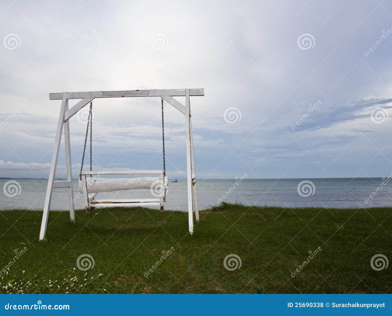 White swing on beach stock photo. Image of sand, blue - 25690338