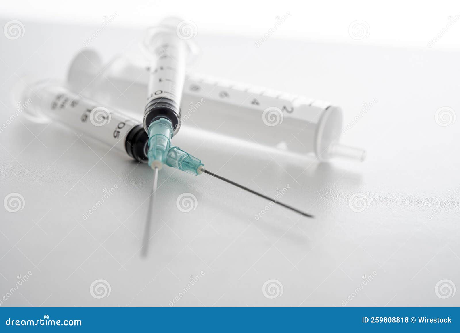 White Table with Syringes on Top of Each Other Stock Photo - Image of ...