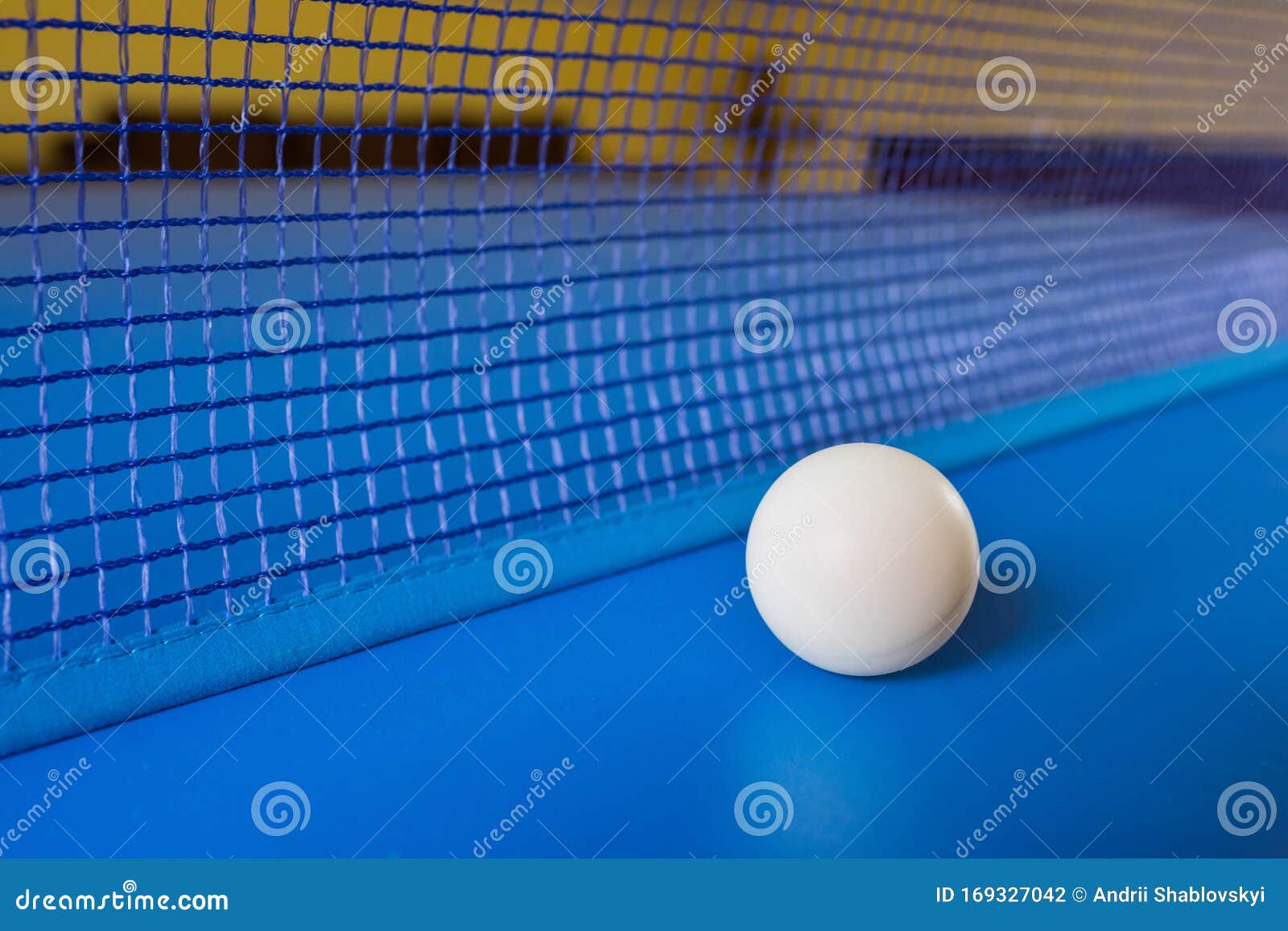 White Table Tennis Ball on Blue Table with Net. Table Tennis Stock ...