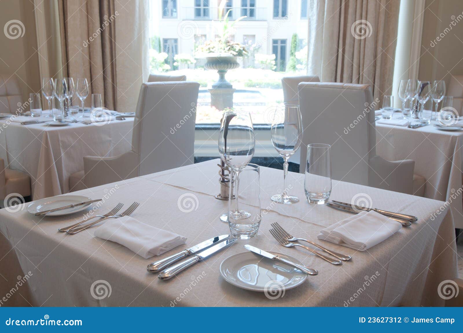 White Tables with Dinnerware Stock Photo - Image of clean, plate: 23627312