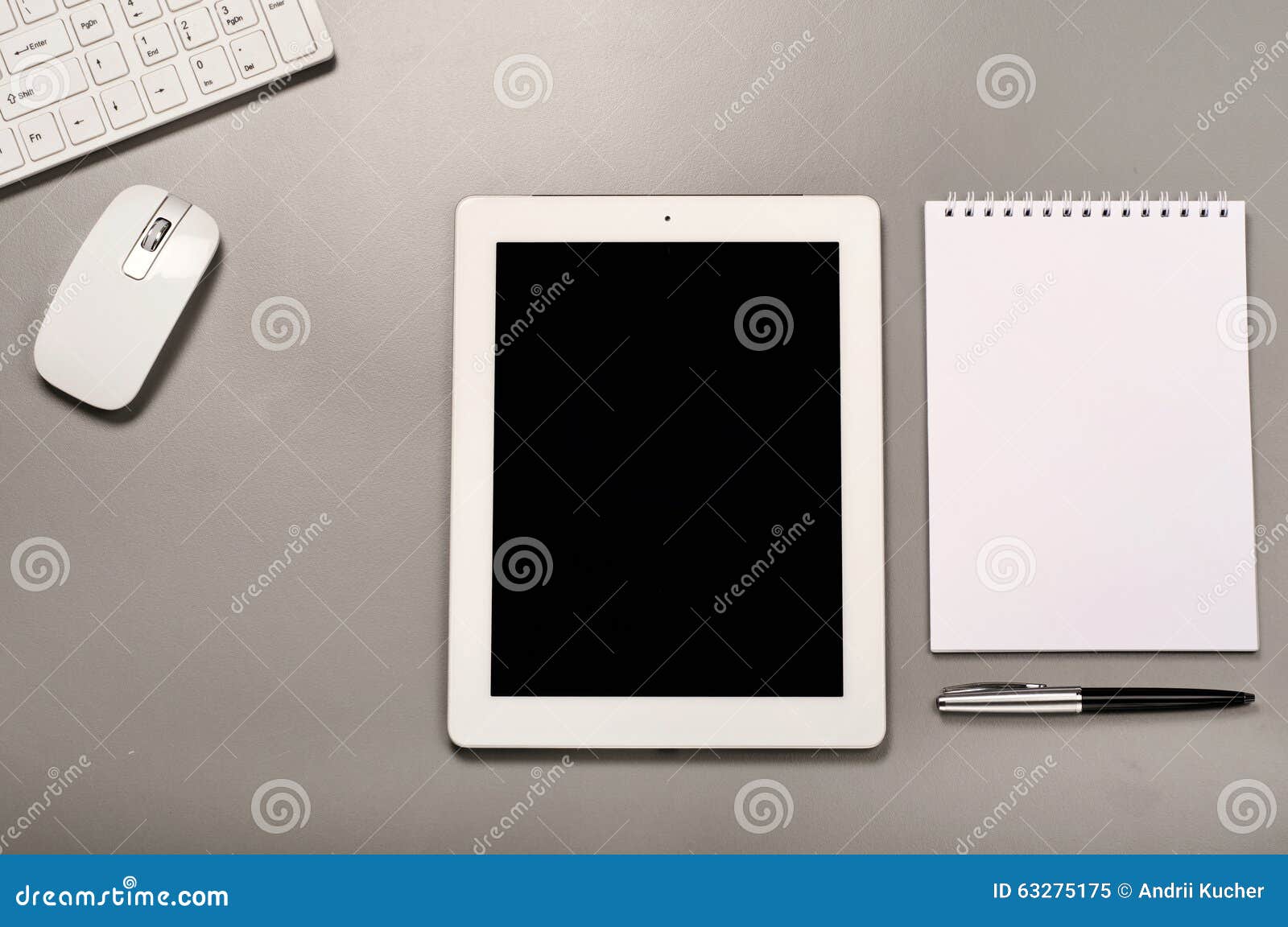 White Tablet Computer on Office Desk with a Notebook Stock Image ...