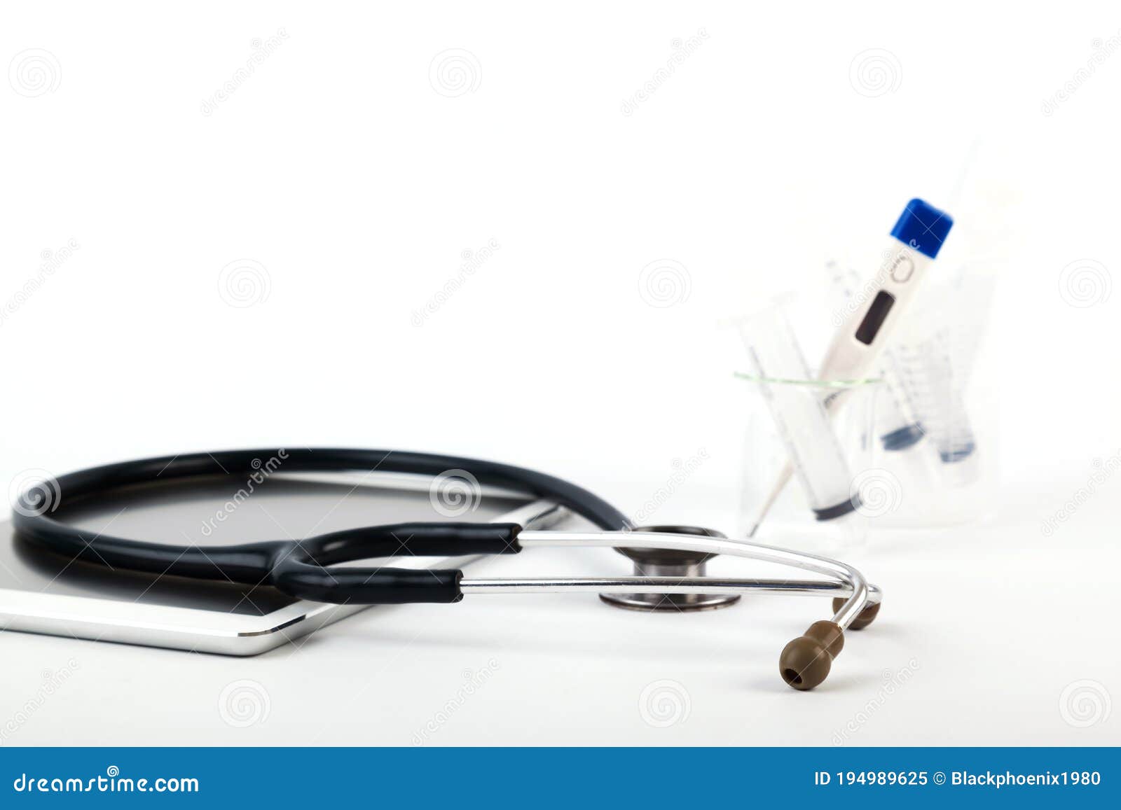 White Tablet, Laptop and Doctor Tools Isolated on White Background ...