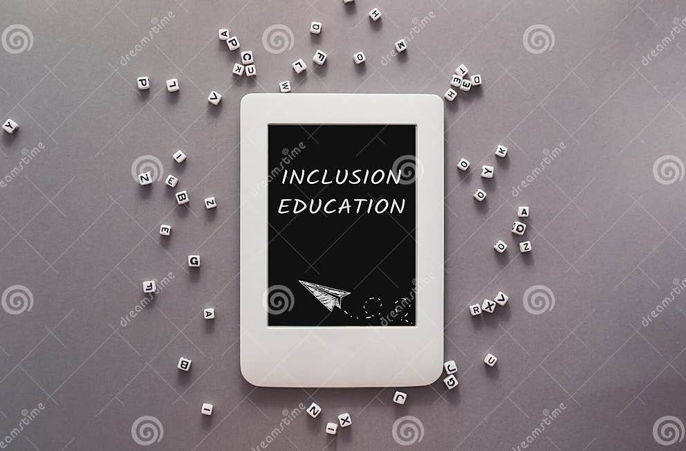A White Tablet with the Word Inclusion on it Stock Photo - Image of ...