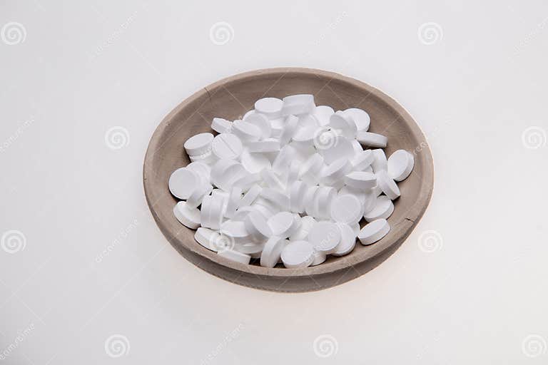 White Tablets on a Clay Plate Stock Image - Image of healthy, clay ...