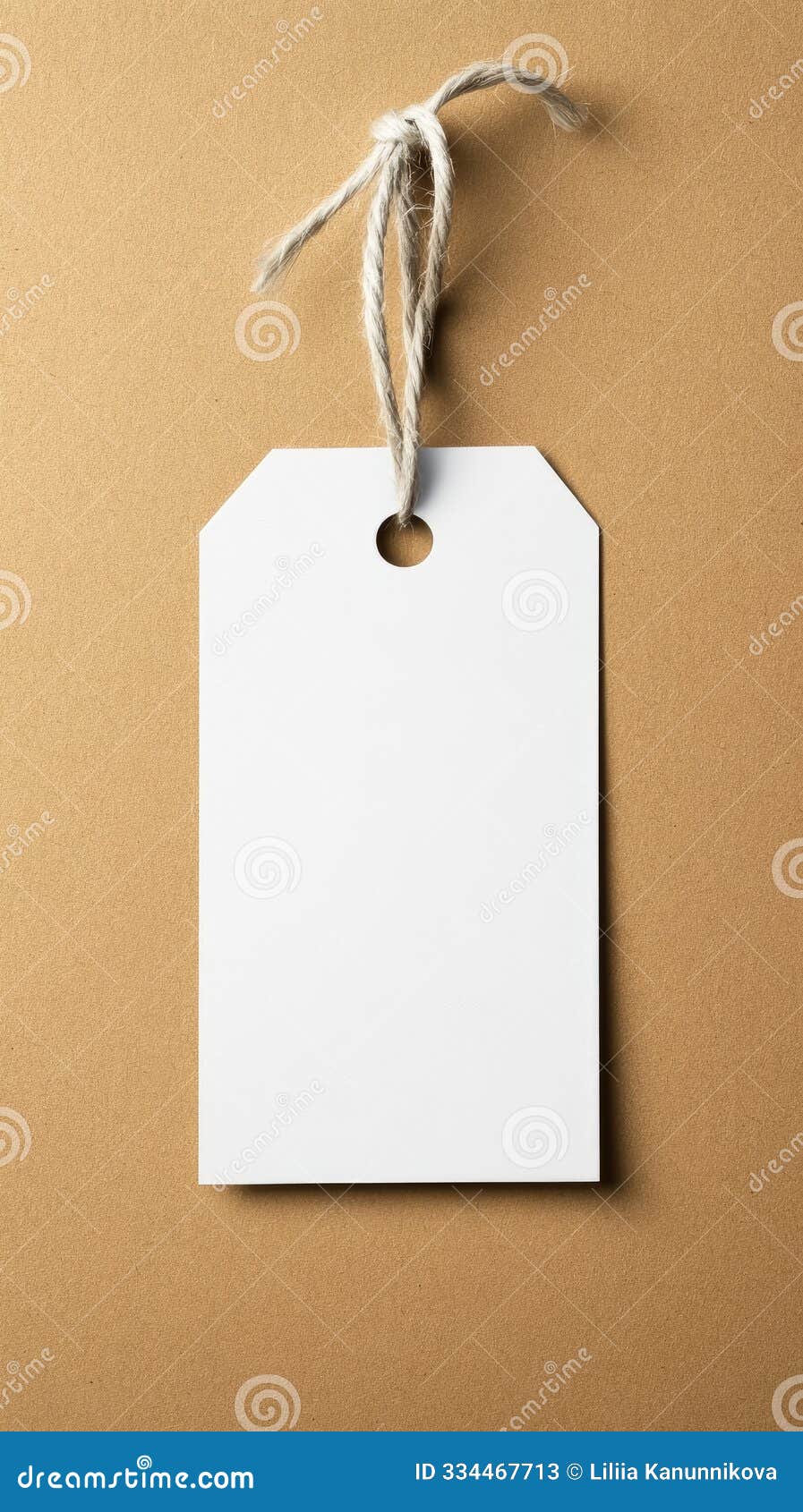 A White Tag is Suspended from a Stack of Cardboard Boxes Featuring a ...