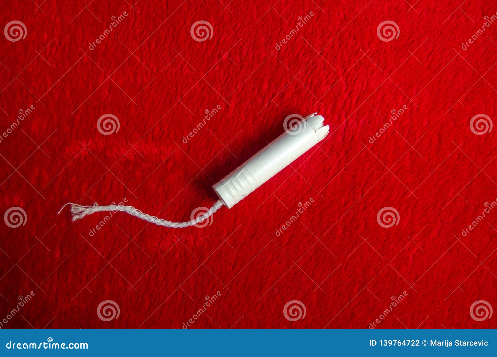 White Tampon on Red Blanket - Minimalistic - Pms Stock Photo - Image of ...