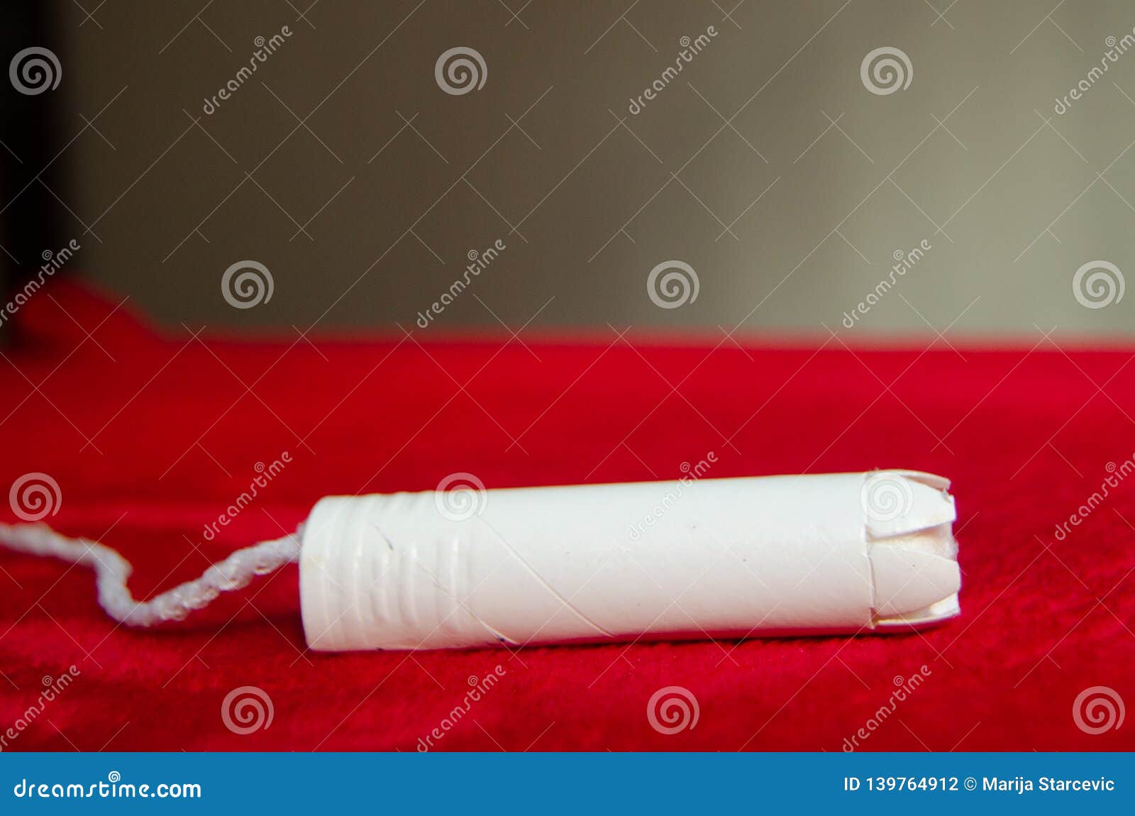 White Tampon on Red Blanket - Minimalistic - Pms Stock Photo - Image of ...