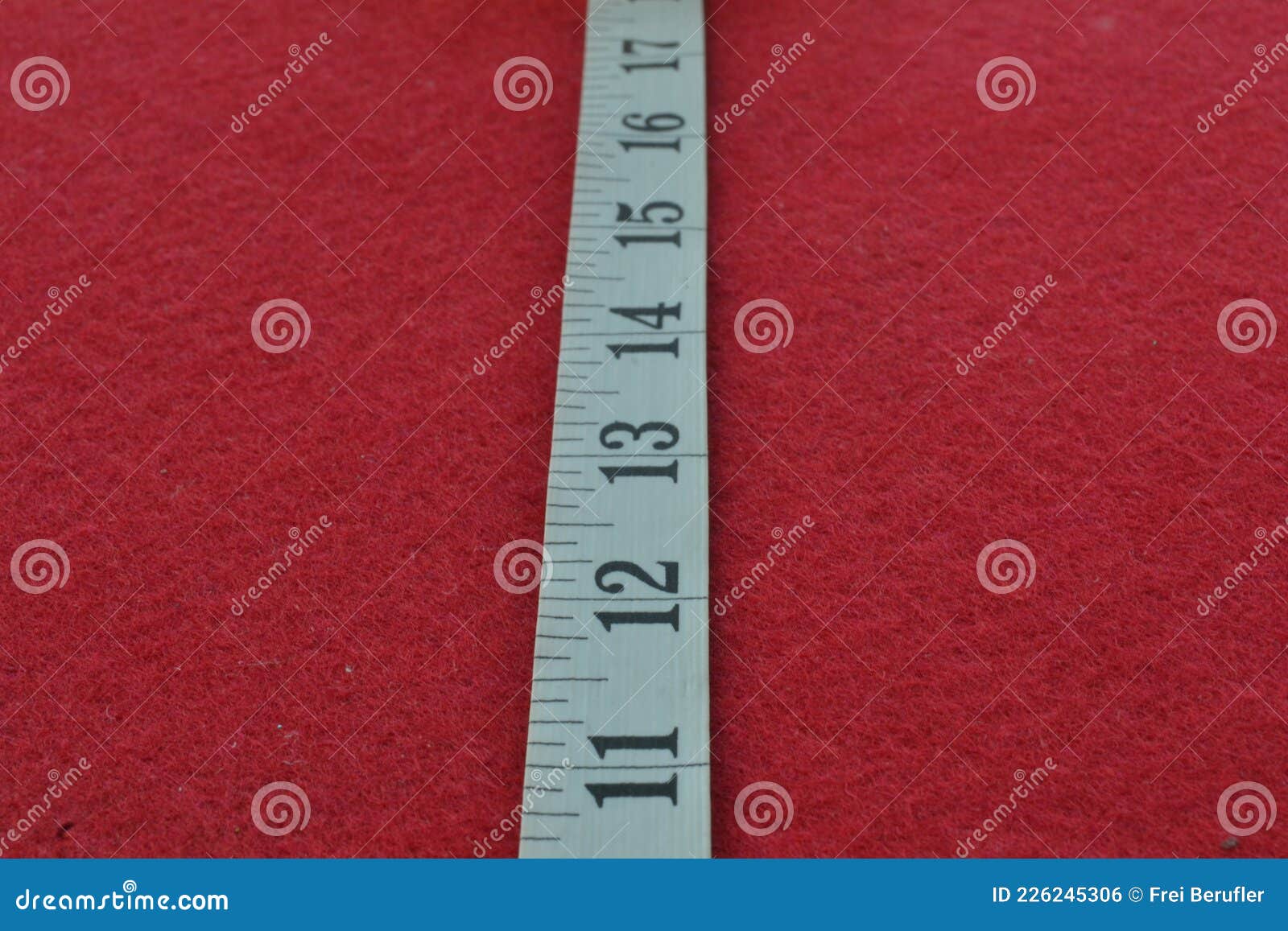 White Tape Measure on a Red Background with the Numbers Stock Photo ...