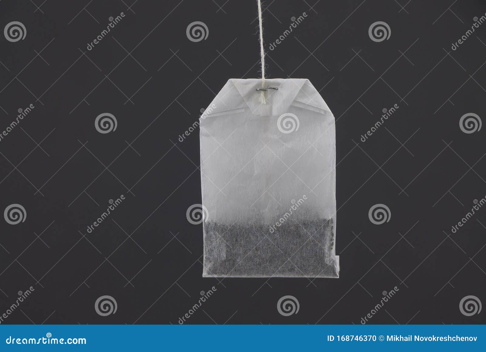 A White Tea Bag on a Dark Background Stock Photo - Image of template ...
