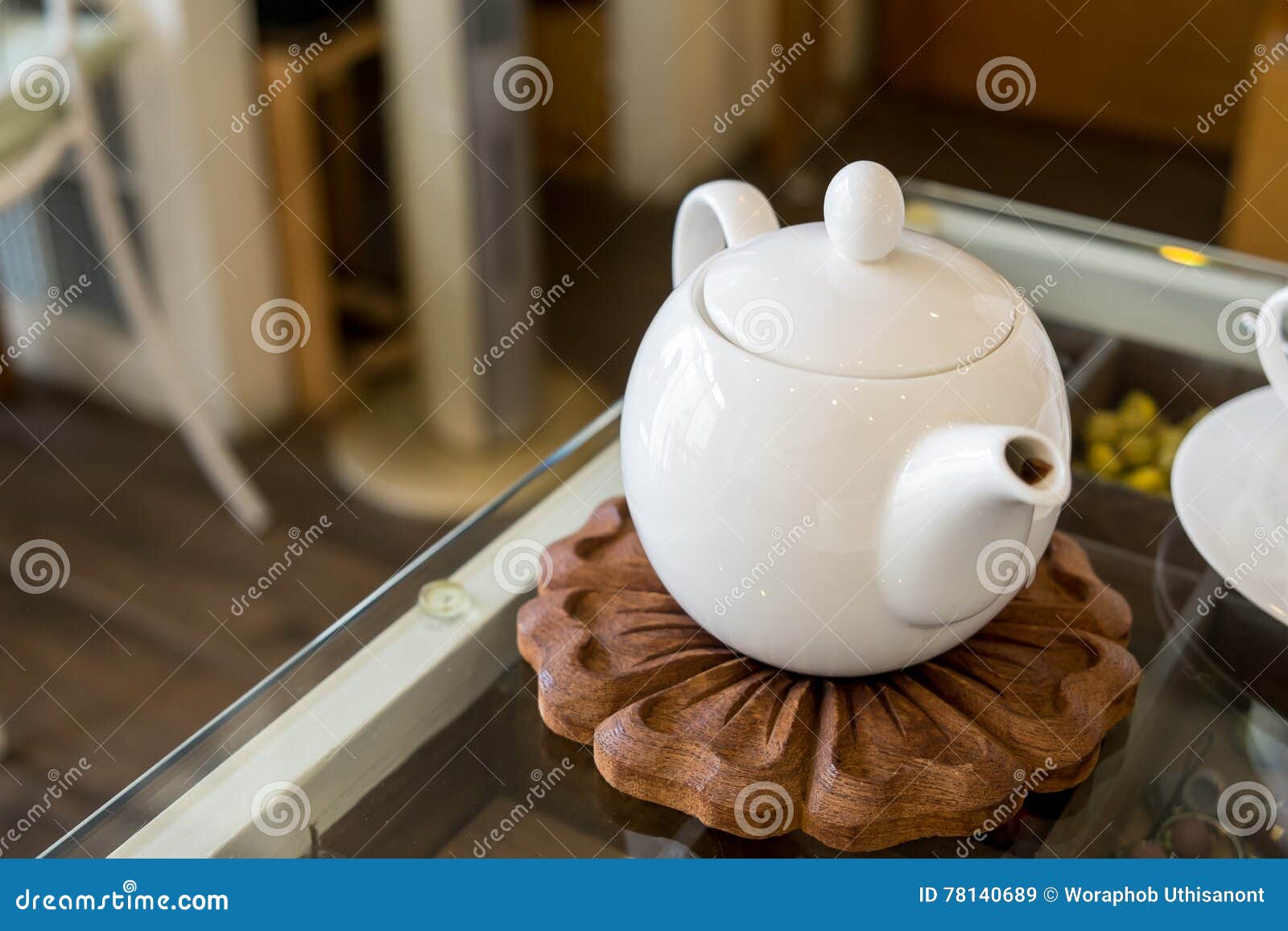 White teapot on the table stock image. Image of utensil - 78140689