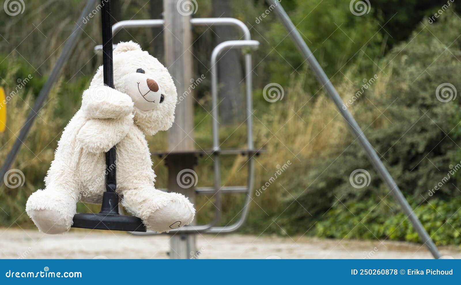 White Teddy Bear, Doing the Zip Line, in the Middle of Nature Stock ...