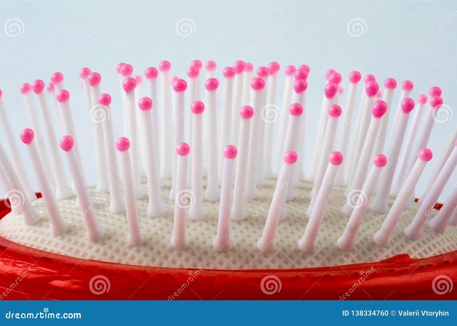 White Teeth of the Comb Close Up on a White Background Stock Photo ...