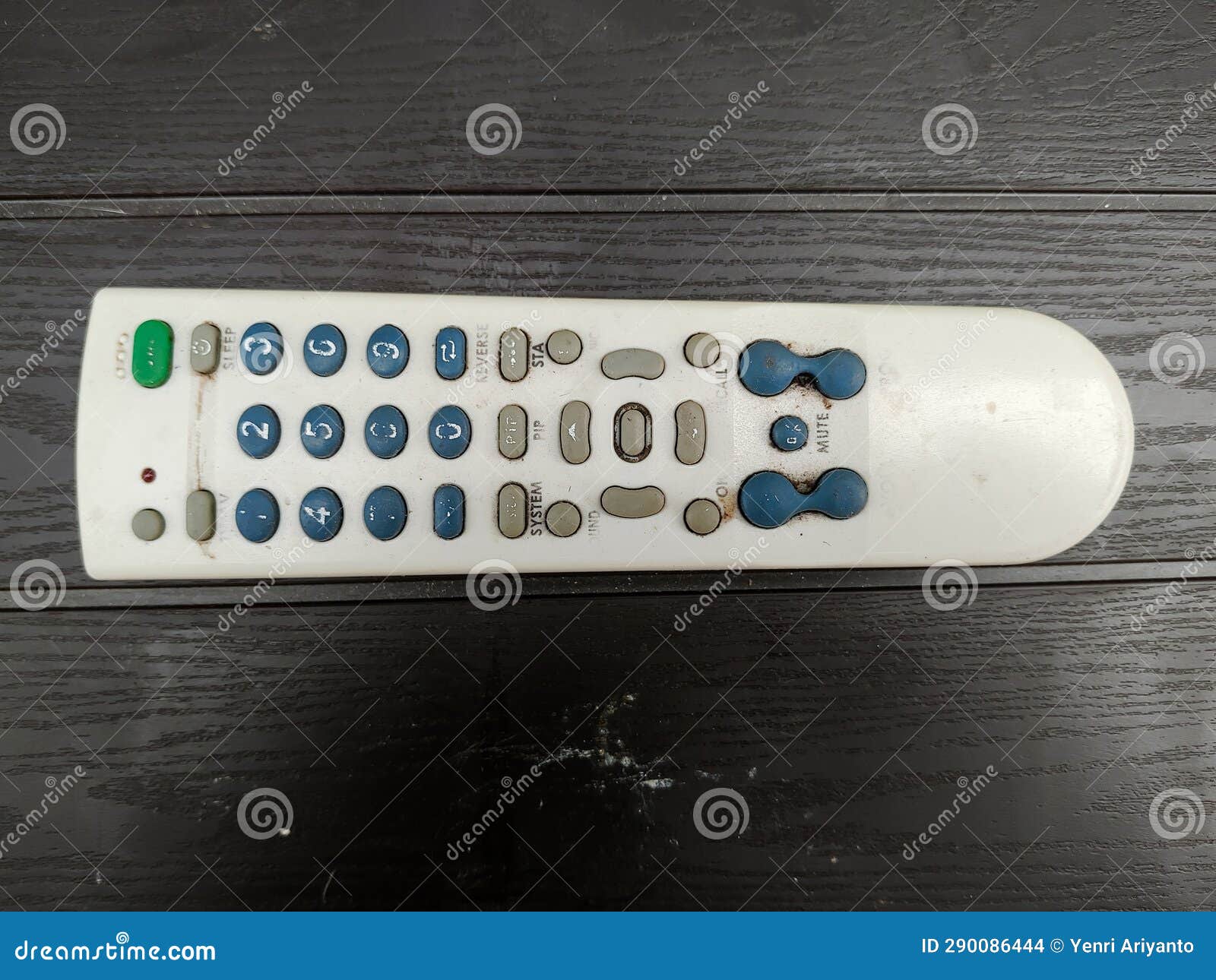 A White Television Remote with Lots of Buttons Stock Photo - Image of ...