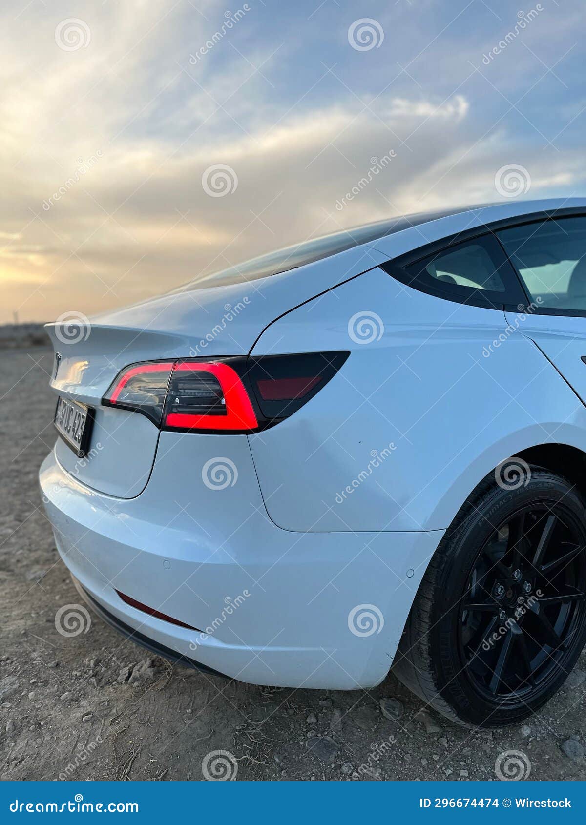 White Tesla Model 3 Parked Outdoors at Sunset Editorial Stock Image ...