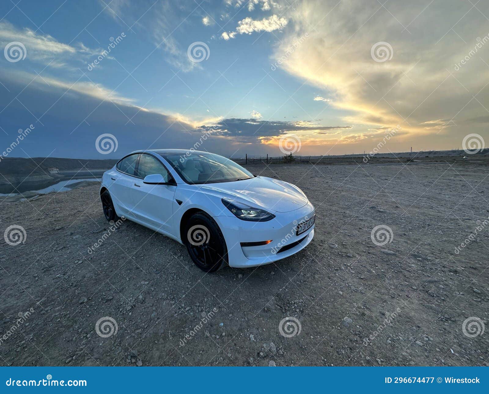 White Tesla Model 3 Parked Outdoors at Sunset Editorial Photography ...