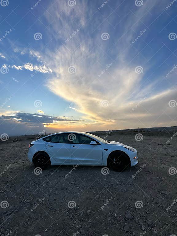 White Tesla Model 3 Parked Outdoors at Sunset Editorial Stock Image ...