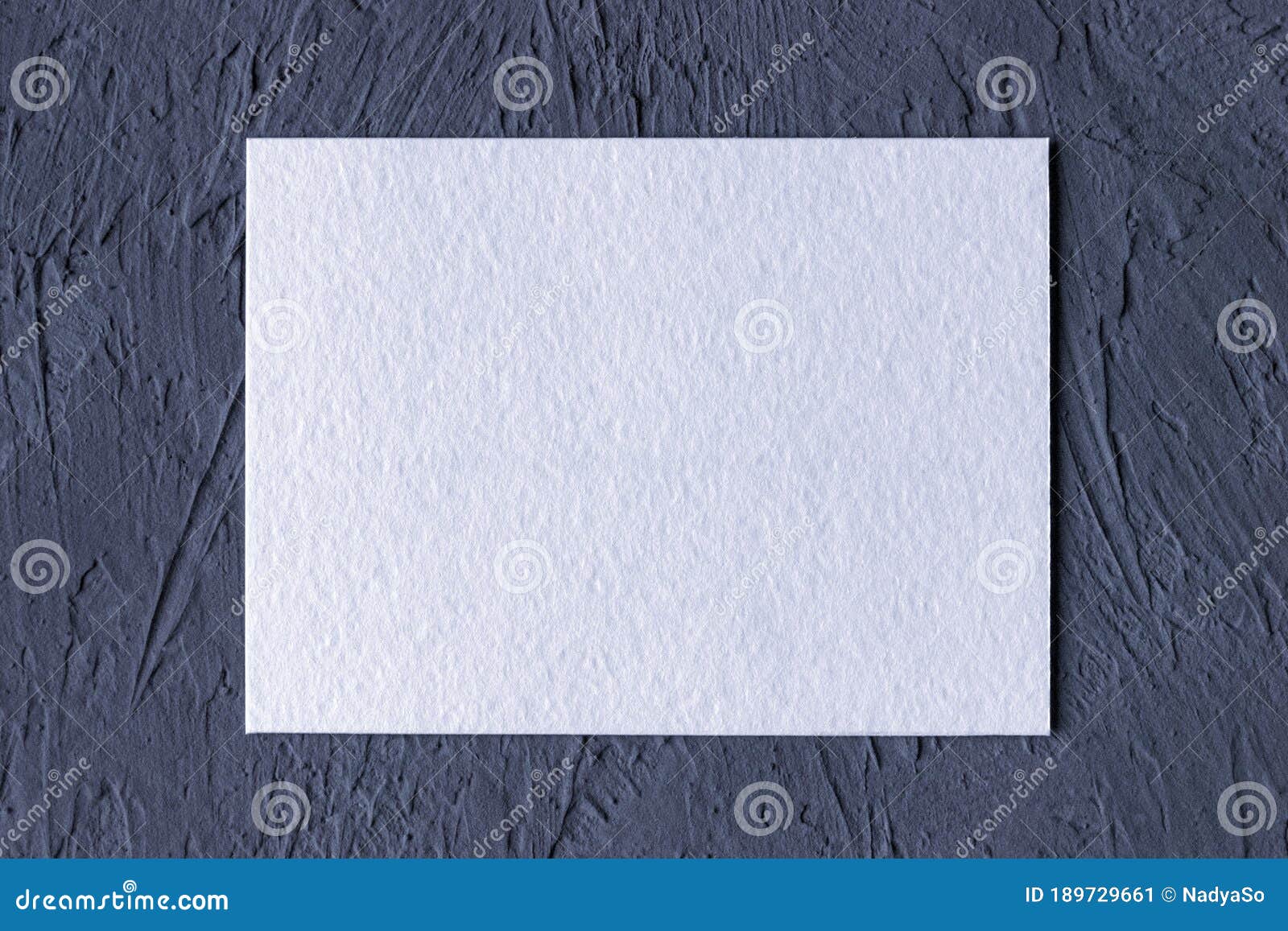 White Textured Paper Card on Dark Gray Solid Background Stock ...