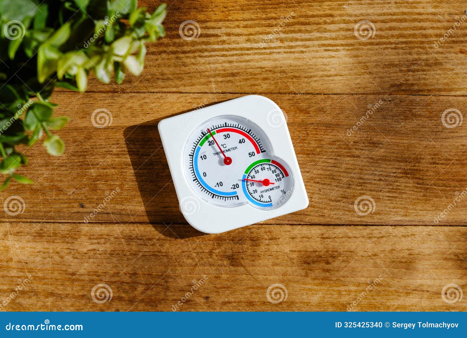 White Thermometer on Wooden Surface Showing a Temperature of 15 Degrees ...