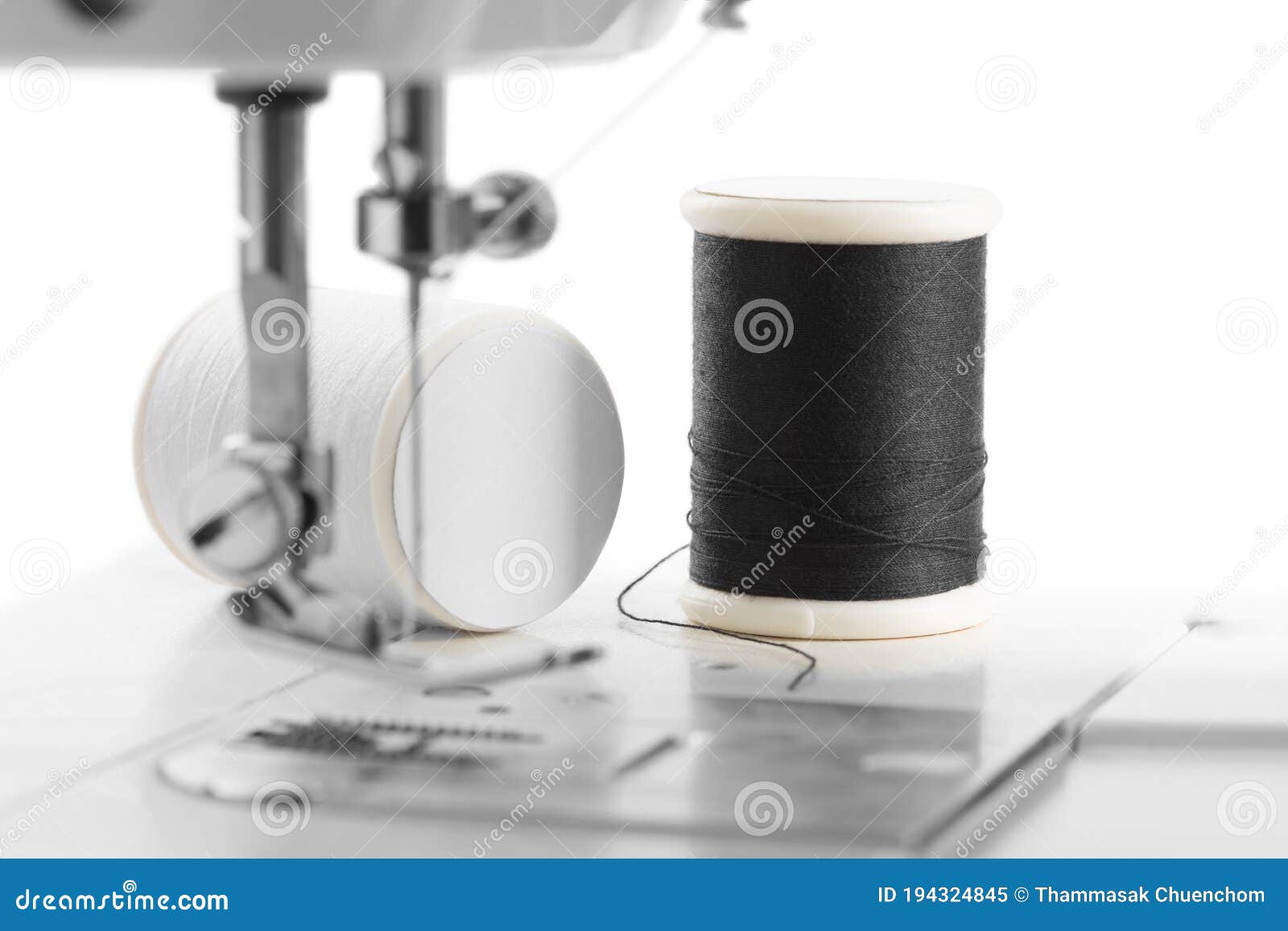 White Thread through the Needle Eye.the Side of the Sewing Machine ...