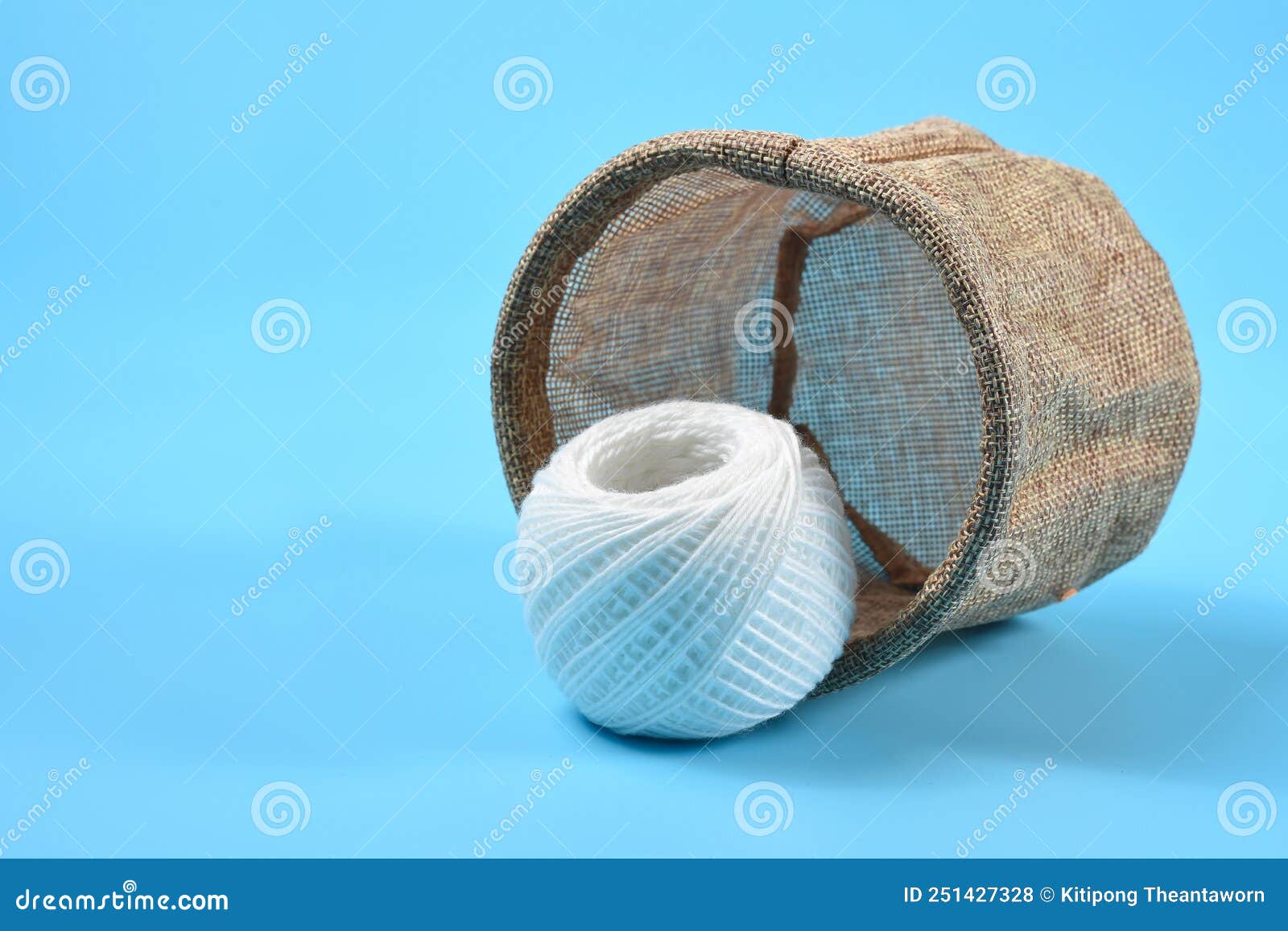 A White Thread Rolls in Front of a Fallen Sack Stock Photo - Image of ...