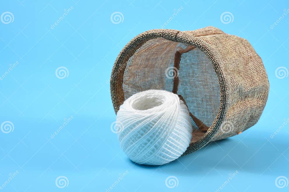 A White Thread Rolls in Front of a Fallen Sack Stock Photo - Image of ...