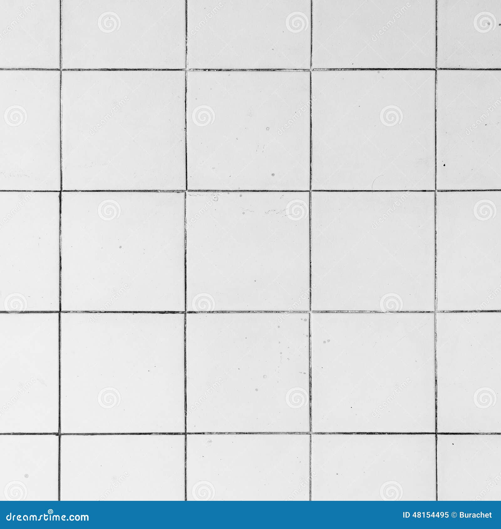 White Tiles Lined Facade Of Modern Building With Narrow Blue Windows ...