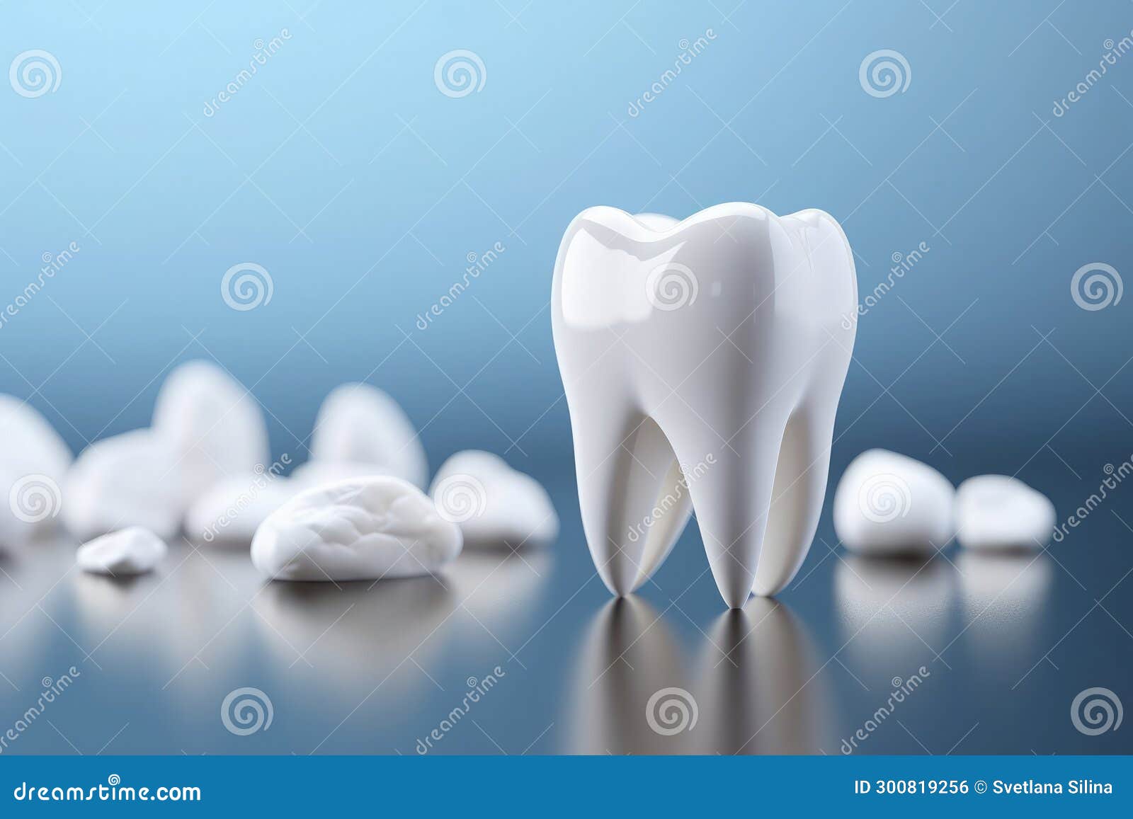 White Tooth on Blue Background Next To White Stones, the Light ...