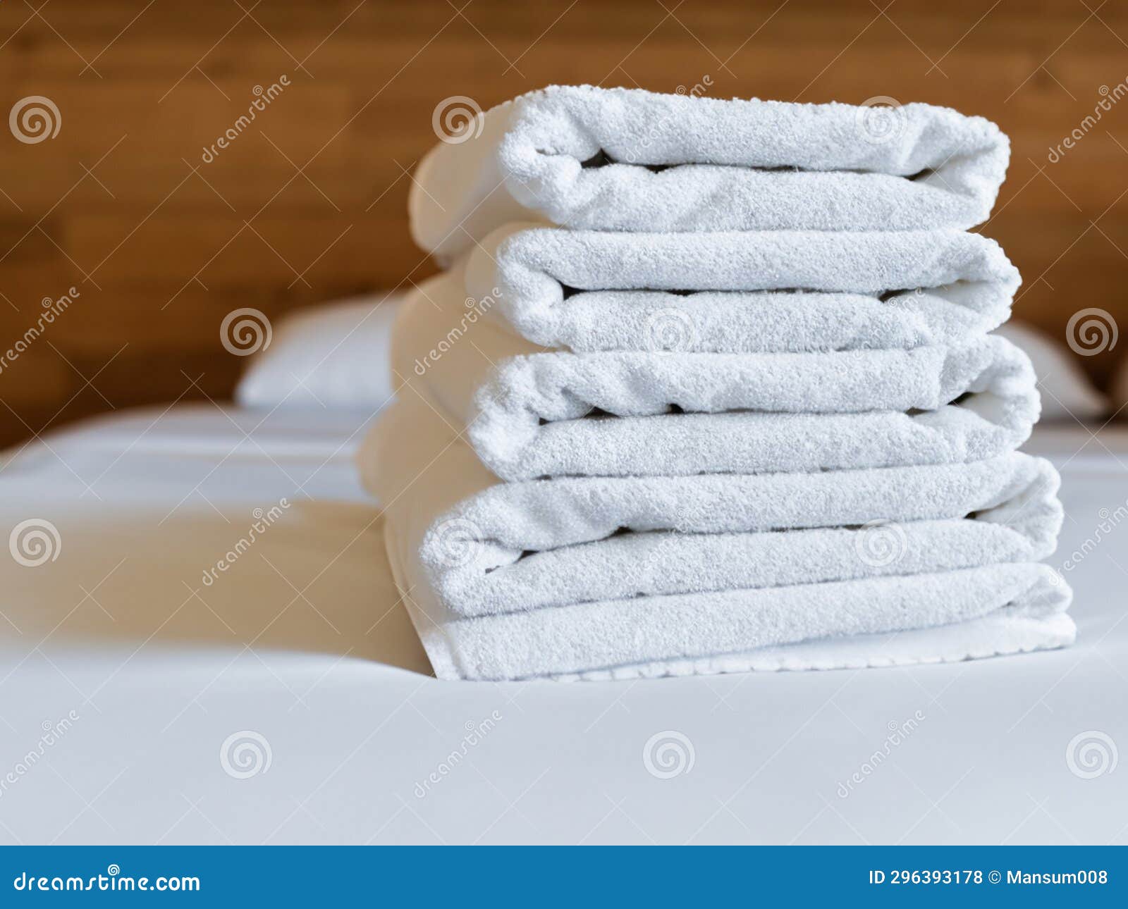 White Towels on the Bed in Hotel Stock Photo - Image of hygiene, towels ...