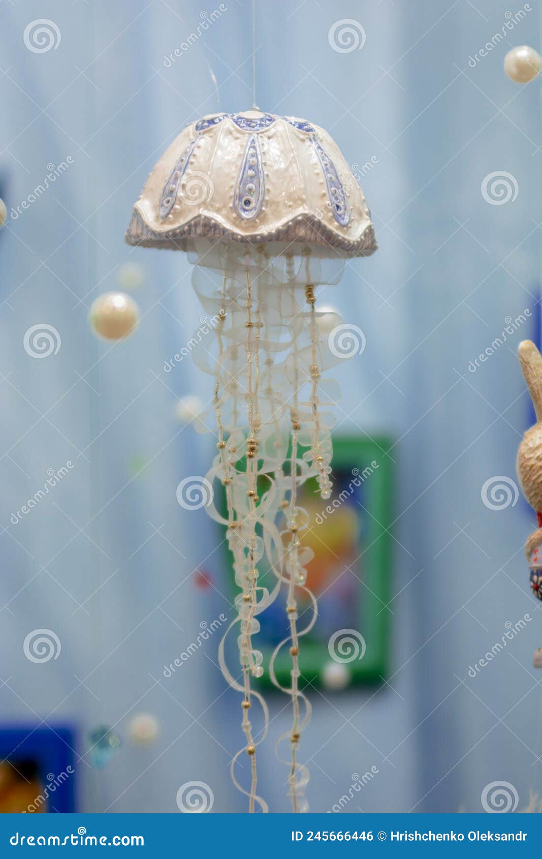 White Toy Jellyfish Hanging on a String Stock Photo - Image of ...