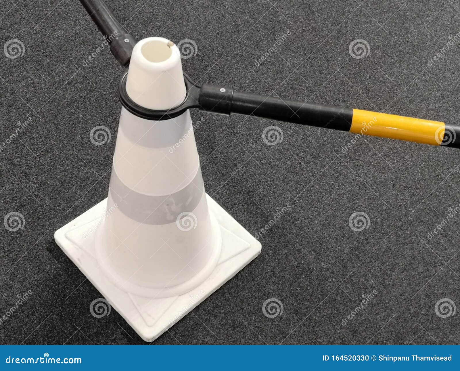 White Traffic Cones Standing with Cone Bar for Driving School. Close Up ...