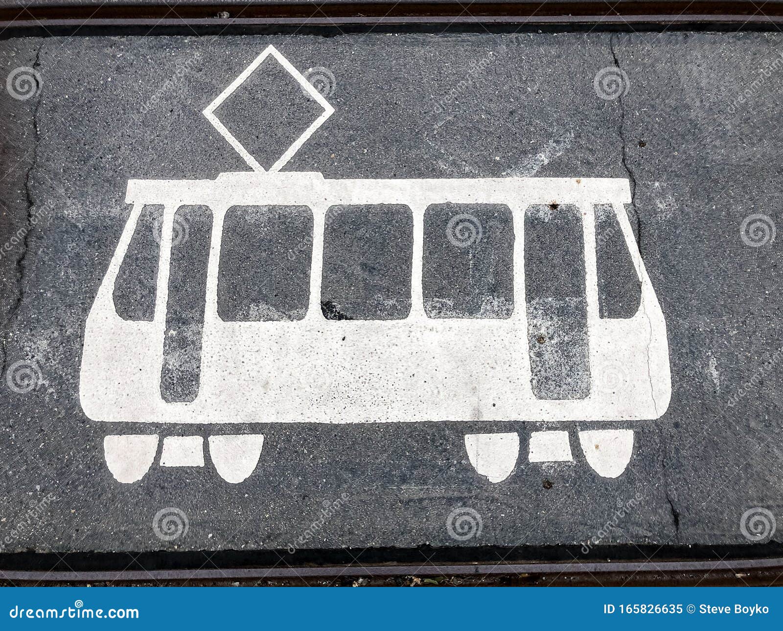 White Tram Sign Painted on Pavement between Rails Stock Image - Image ...