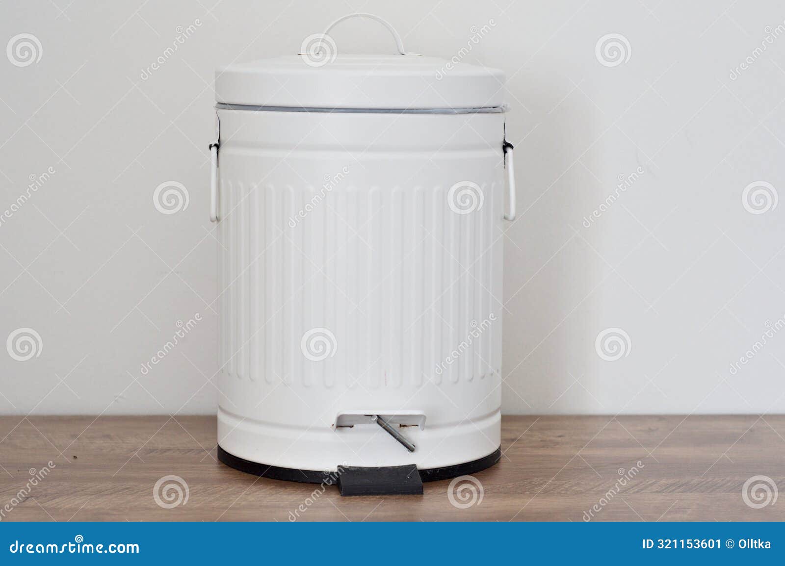 White Trash Can with Copy Space on White Wall. Trash Bin Stock Image ...