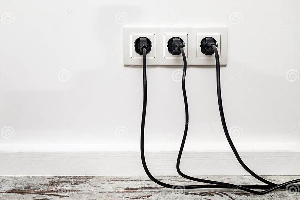 White Triple Outlet on White Wall Stock Photo - Image of indoors ...