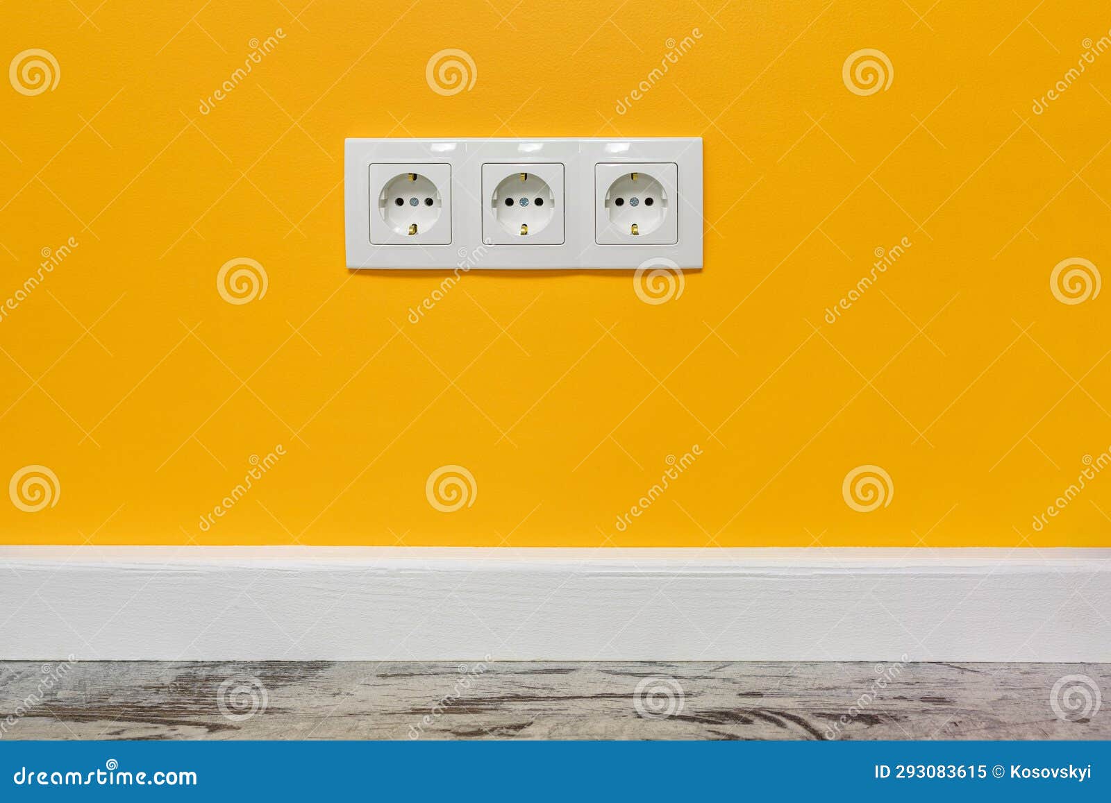 White Triple Outlet on Yellow Wall Stock Image - Image of flooring ...
