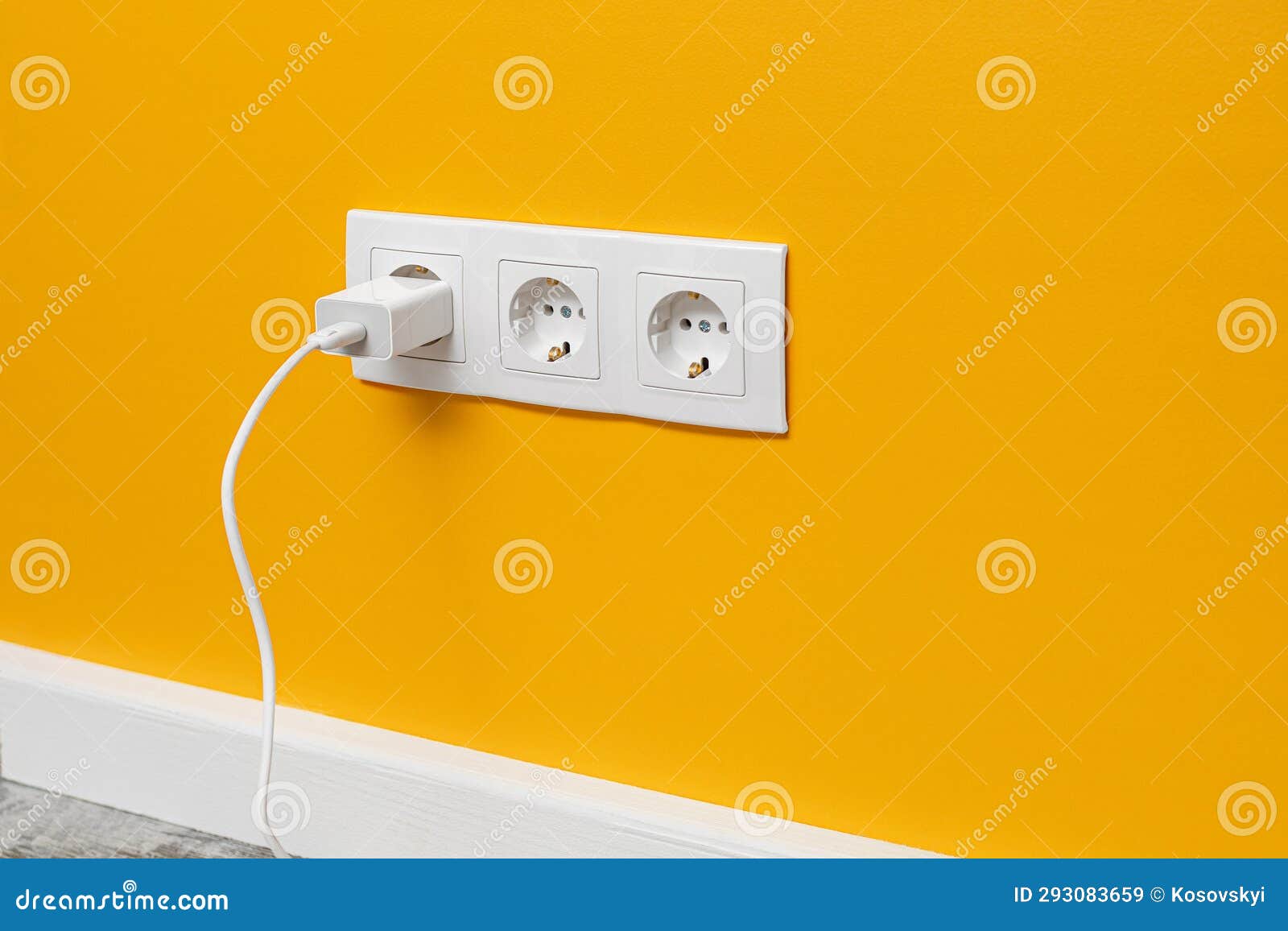 White Triple Outlet on Yellow Wall Stock Image - Image of plug, side ...
