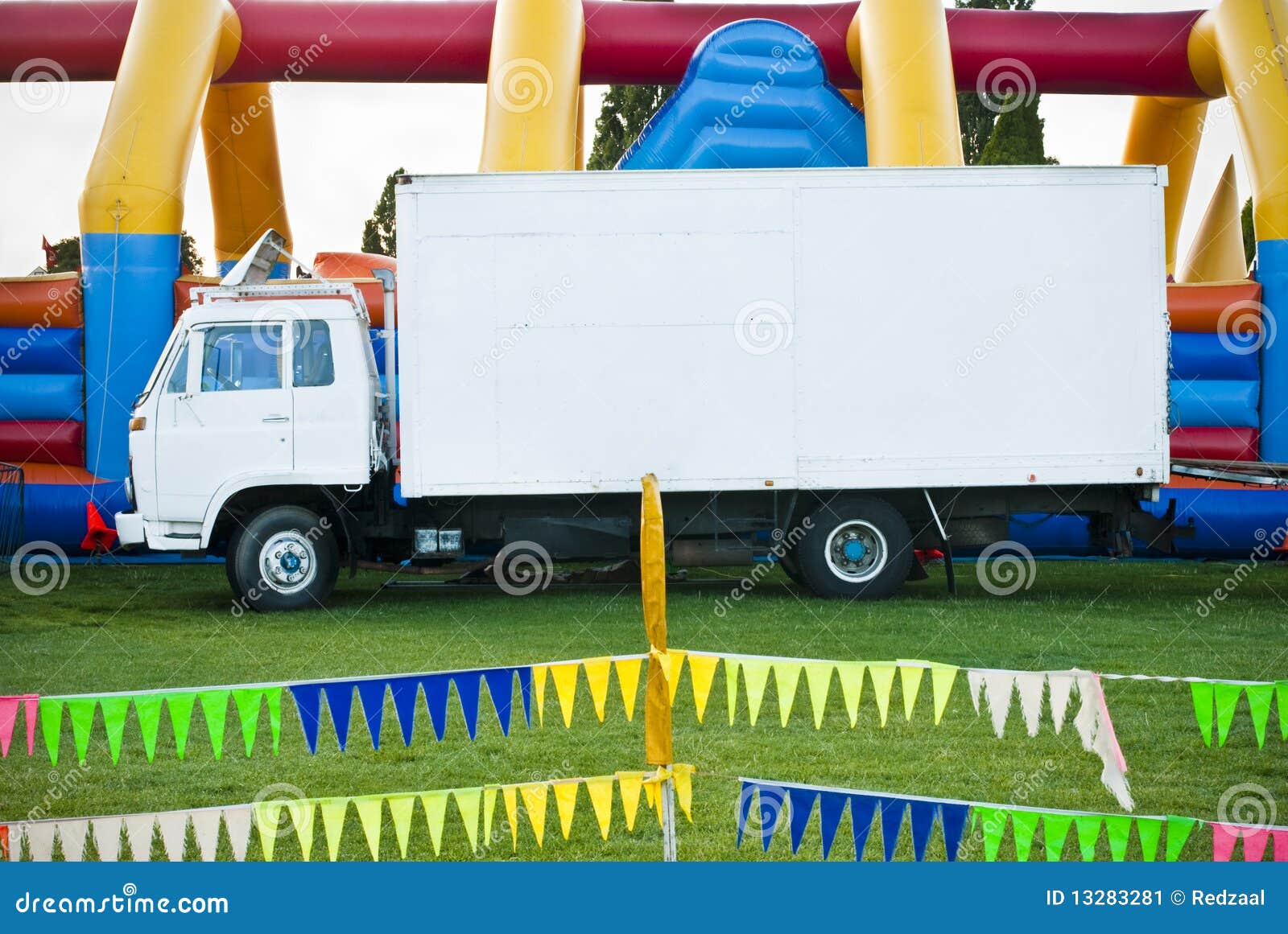 White truck at fun fair stock image. Image of lorry, grass - 13283281